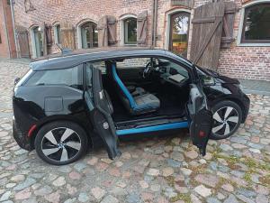 Black BMW I3 2016 in Klaipeda, with an engine capacity of 0.65 L and mileage of 95 thousand km for 7500 €, photo 8 on AUTOMOTO.COM.LV