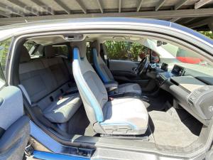 White BMW I3 2021 in Riga, with an engine capacity of 0.00 L and mileage of 60 thousand km for 15940 €, photo 12 on AUTOMOTO.COM.LV