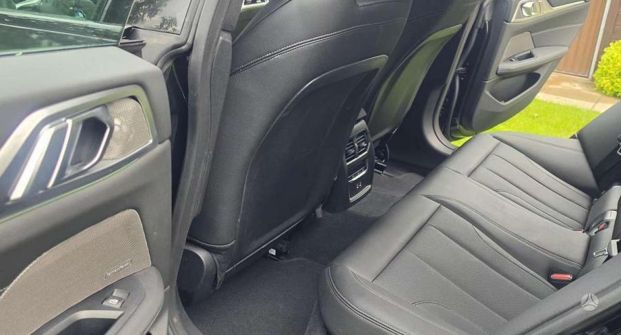 Black BMW i4 2025 in Vilnius, with an engine capacity of 0.00 L and mileage of 27 thousand km for 34900 €, photo 20 on AUTOMOTO.COM.LV
