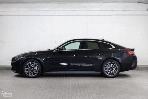 Black BMW i4 2022 in Vilnius, with an engine capacity of 0.00 L and mileage of 88 thousand km for 38491 €, photo 5 on AUTOMOTO.COM.LV