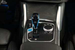 Black BMW i4 2022 in Vilnius, with an engine capacity of 0.00 L and mileage of 88 thousand km for 38491 €, photo 19 on AUTOMOTO.COM.LV