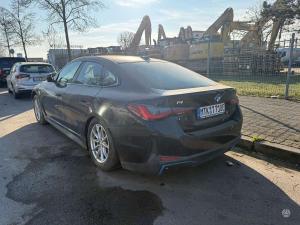 Melns BMW i4 2023 Panevēža, ar dzinēja tilpumu 0.00 L un nobraukumu 80 tūkst. km par 15590 €, foto  vietnē AUTOMOTO.COM.LV