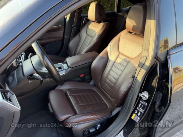 Melns BMW i4 2021 Tallina, ar dzinēja tilpumu 0.00 L un nobraukumu 64 tūkst. km par 43900 €, foto 11 vietnē AUTOMOTO.COM.LV