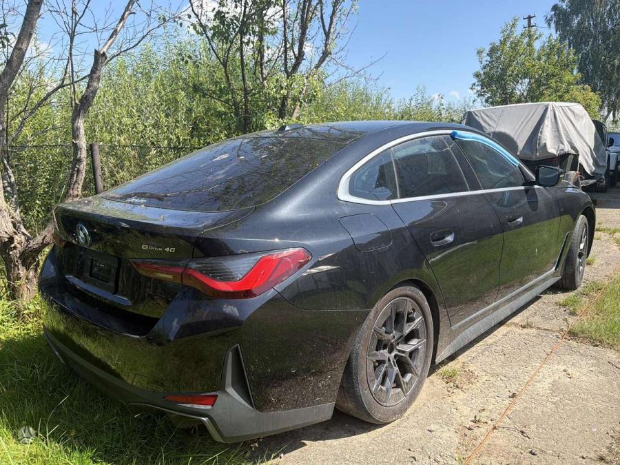 Black BMW i4 2025 in Siauliai, with an engine capacity of 0.00 L and mileage of 20 thousand km for 27500 €, photo 4 on AUTOMOTO.COM.LV