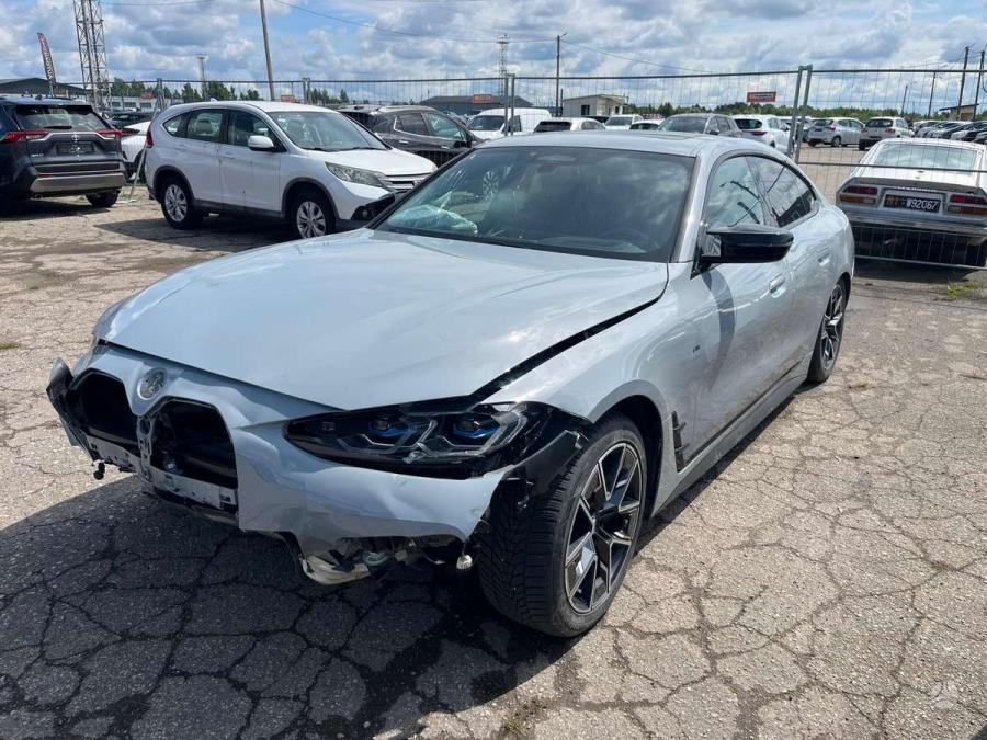 Grey BMW i4 2023 in Panevezys, with an engine capacity of 0.00 L and mileage of 57 thousand km for 18800 €, photo 1 on AUTOMOTO.COM.LV