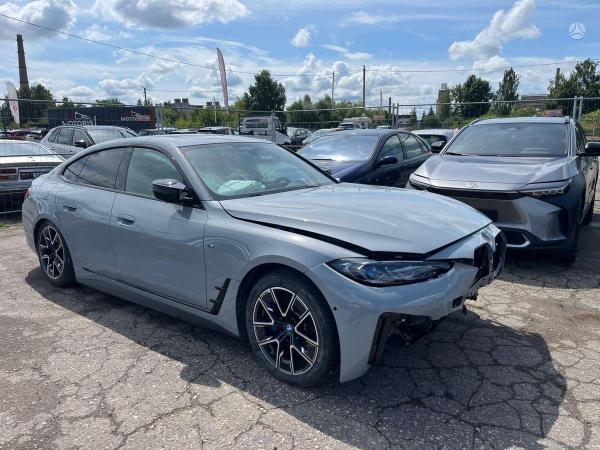 Grey BMW i4 2023 in Panevezys, with an engine capacity of 0.00 L and mileage of 57 thousand km for 18800 €, photo 2 on AUTOMOTO.COM.LV