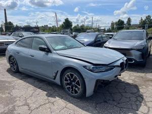 Grey BMW i4 2023 in Panevezys, with an engine capacity of 0.00 L and mileage of 57 thousand km for 18800 €, photo 3 on AUTOMOTO.COM.LV