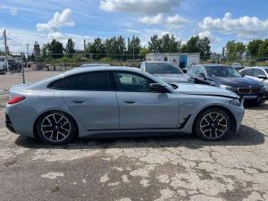 Grey BMW i4 2023 in Panevezys, with an engine capacity of 0.00 L and mileage of 57 thousand km for 18800 €, photo 4 on AUTOMOTO.COM.LV