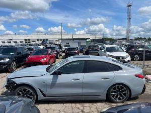 Grey BMW i4 2023 in Panevezys, with an engine capacity of 0.00 L and mileage of 57 thousand km for 18800 €, photo 8 on AUTOMOTO.COM.LV