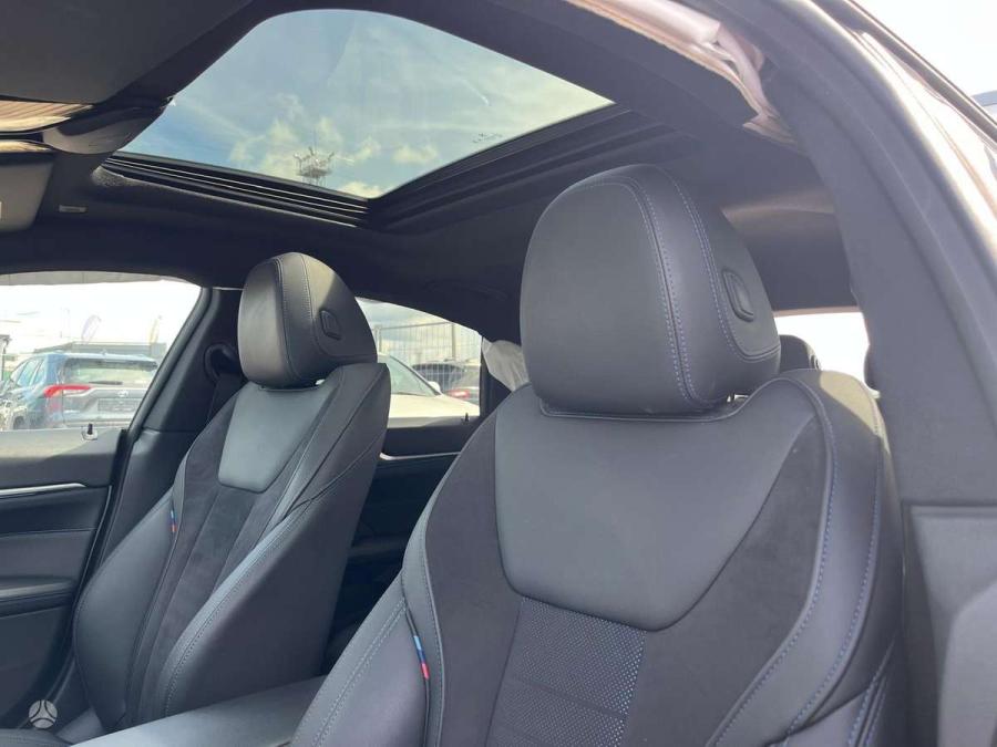 Grey BMW i4 2023 in Panevezys, with an engine capacity of 0.00 L and mileage of 57 thousand km for 18800 €, photo 10 on AUTOMOTO.COM.LV