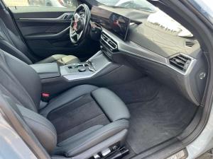Grey BMW i4 2023 in Panevezys, with an engine capacity of 0.00 L and mileage of 57 thousand km for 18800 €, photo 11 on AUTOMOTO.COM.LV