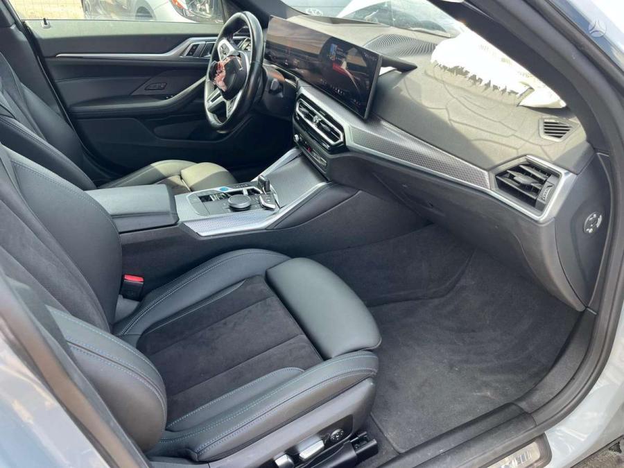 Grey BMW i4 2023 in Panevezys, with an engine capacity of 0.00 L and mileage of 57 thousand km for 18800 €, photo 11 on AUTOMOTO.COM.LV