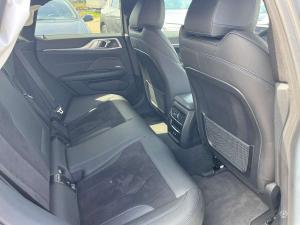 Grey BMW i4 2023 in Panevezys, with an engine capacity of 0.00 L and mileage of 57 thousand km for 18800 €, photo 12 on AUTOMOTO.COM.LV