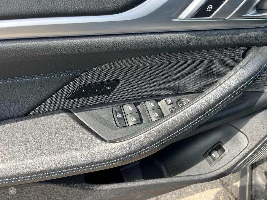 Grey BMW i4 2023 in Panevezys, with an engine capacity of 0.00 L and mileage of 57 thousand km for 18800 €, photo 22 on AUTOMOTO.COM.LV