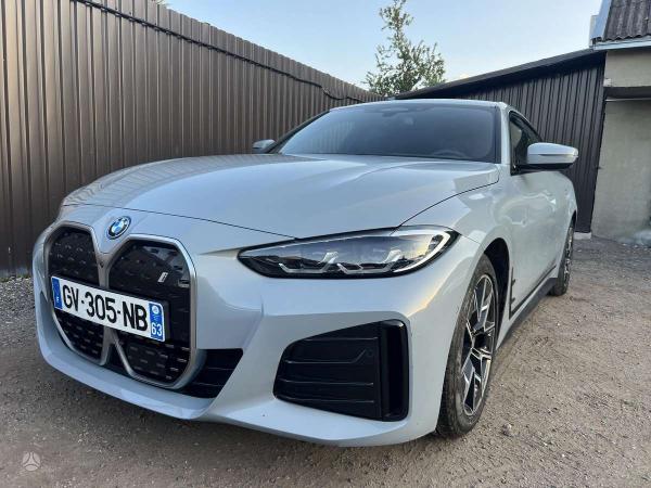 Grey BMW i4 2024 in Kaunas, with an engine capacity of 0.00 L and mileage of 57 thousand km for 32500 €, photo 1 on AUTOMOTO.COM.LV