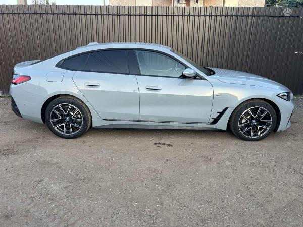 Grey BMW i4 2024 in Kaunas, with an engine capacity of 0.00 L and mileage of 57 thousand km for 32500 €, photo 5 on AUTOMOTO.COM.LV