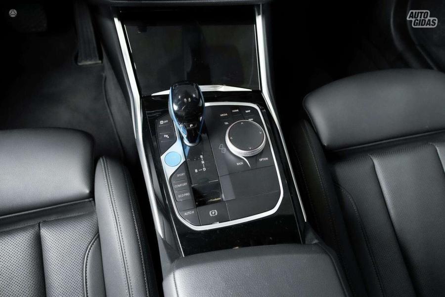 White BMW i4 2023 in Marijampole, with an engine capacity of 0.00 L and mileage of 74 thousand km for 34250 €, photo 21 on AUTOMOTO.COM.LV