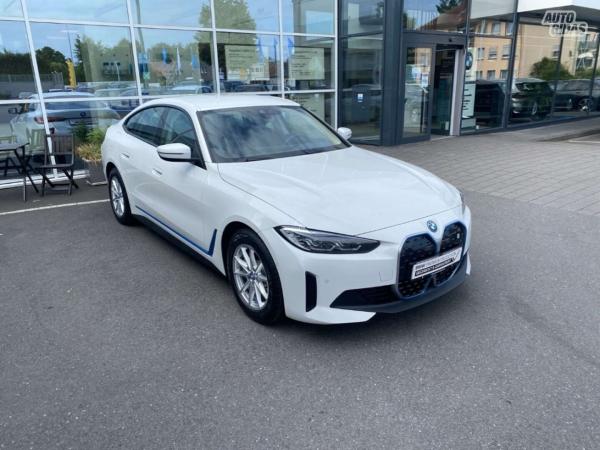 White BMW i4 2022 in Kaunas, with an engine capacity of 0.00 L and mileage of 74 thousand km for 32535 €, photo 5 on AUTOMOTO.COM.LV