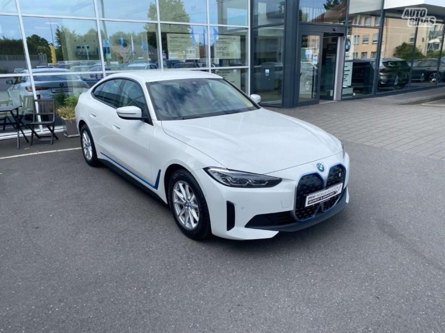 White BMW i4 2022 in Kaunas, with an engine capacity of 0.00 L and mileage of 74 thousand km for 32535 €, photo 5 on AUTOMOTO.COM.LV