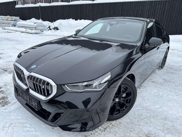 Black BMW i5 2023 in Kaunas, with an engine capacity of 0.00 L and mileage of 36 thousand km for 49900 €, photo 1 on AUTOMOTO.COM.LV