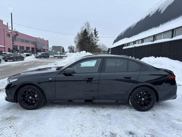 Black BMW i5 2023 in Kaunas, with an engine capacity of 0.00 L and mileage of 36 thousand km for 49900 €, photo 3 on AUTOMOTO.COM.LV