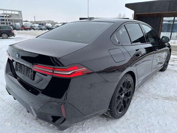 Black BMW i5 2023 in Kaunas, with an engine capacity of 0.00 L and mileage of 36 thousand km for 49900 €, photo 6 on AUTOMOTO.COM.LV