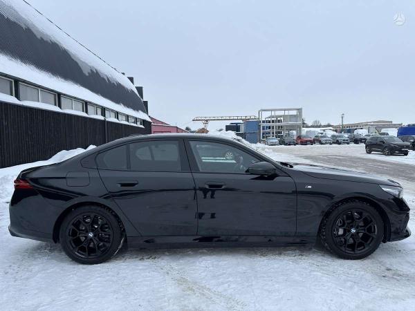Black BMW i5 2023 in Kaunas, with an engine capacity of 0.00 L and mileage of 36 thousand km for 49900 €, photo 10 on AUTOMOTO.COM.LV