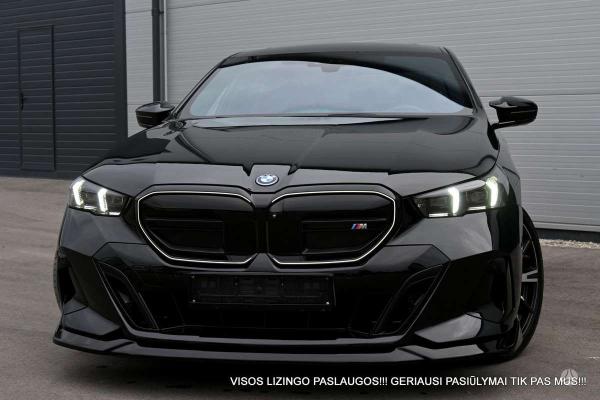 Black BMW i5 2023 in Kretinga, with an engine capacity of 0.00 L and mileage of 27 thousand km for 66999 €, photo 3 on AUTOMOTO.COM.LV