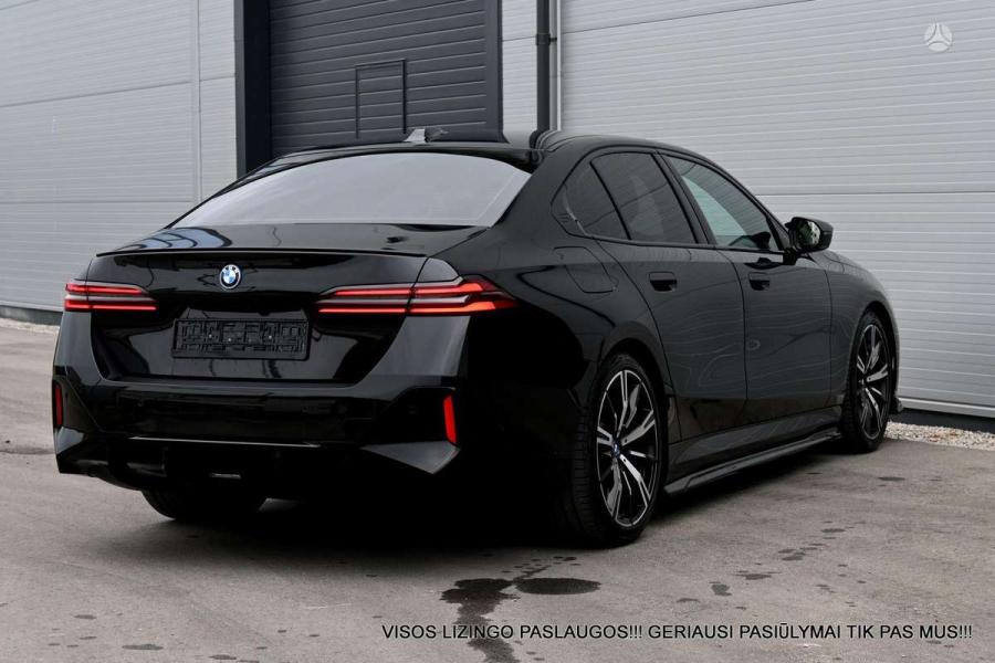 Black BMW i5 2023 in Kretinga, with an engine capacity of 0.00 L and mileage of 27 thousand km for 66999 €, photo 9 on AUTOMOTO.COM.LV