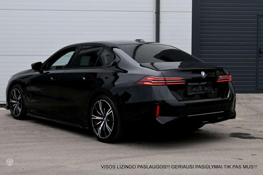 Black BMW i5 2023 in Kretinga, with an engine capacity of 0.00 L and mileage of 27 thousand km for 66999 €, photo 11 on AUTOMOTO.COM.LV