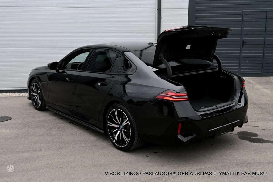 Black BMW i5 2023 in Kretinga, with an engine capacity of 0.00 L and mileage of 27 thousand km for 66999 €, photo 13 on AUTOMOTO.COM.LV