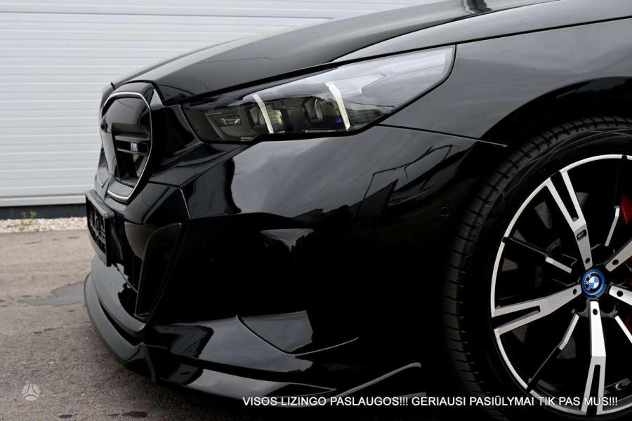 Black BMW i5 2023 in Kretinga, with an engine capacity of 0.00 L and mileage of 27 thousand km for 66999 €, photo 15 on AUTOMOTO.COM.LV