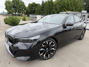Black BMW i5 2023 in Klaipeda, with an engine capacity of 0.00 L and mileage of 199 thousand km for 39800 €, photo  on AUTOMOTO.COM.LV