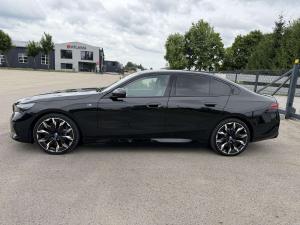 Black BMW i5 2023 in Klaipeda, with an engine capacity of 0.00 L and mileage of 199 thousand km for 39800 €, photo 13 on AUTOMOTO.COM.LV