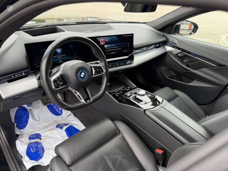 Black BMW i5 2023 in Klaipeda, with an engine capacity of 0.00 L and mileage of 199 thousand km for 39800 €, photo 24 on AUTOMOTO.COM.LV
