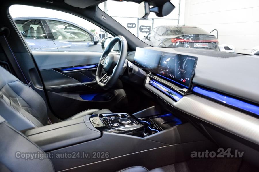 Grey BMW i5 2024 in Tallinn, with an engine capacity of 0.00 L and mileage of 26 thousand km for 64900 €, photo 12 on AUTOMOTO.COM.LV