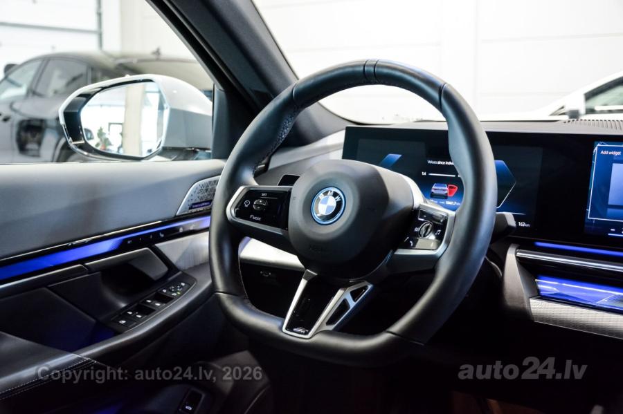 Grey BMW i5 2024 in Tallinn, with an engine capacity of 0.00 L and mileage of 26 thousand km for 64900 €, photo 14 on AUTOMOTO.COM.LV