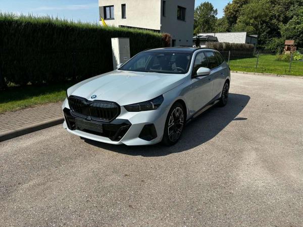 Grey BMW i5 2024 in Kaunas, with an engine capacity of 0.00 L and mileage of 27 thousand km for 49800 €, photo 2 on AUTOMOTO.COM.LV