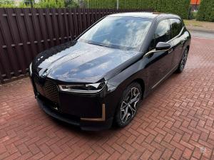 Black BMW iX 2021 in Vilnius, with an engine capacity of 0.00 L and mileage of 130 thousand km for 38900 €, photo  on AUTOMOTO.COM.LV