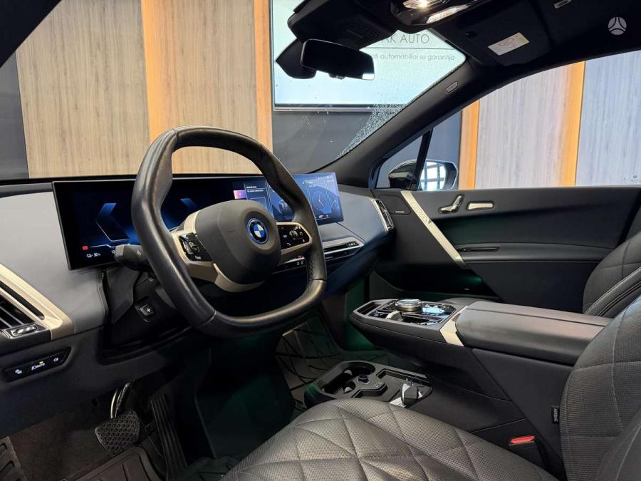 Black BMW iX 2022 in Kaunas, with an engine capacity of 0.00 L and mileage of 143 thousand km for 36990 €, photo 13 on AUTOMOTO.COM.LV