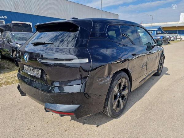 Black BMW iX 2022 in Siauliai, with an engine capacity of 0.00 L and mileage of 79 thousand km for 29900 €, photo 4 on AUTOMOTO.COM.LV
