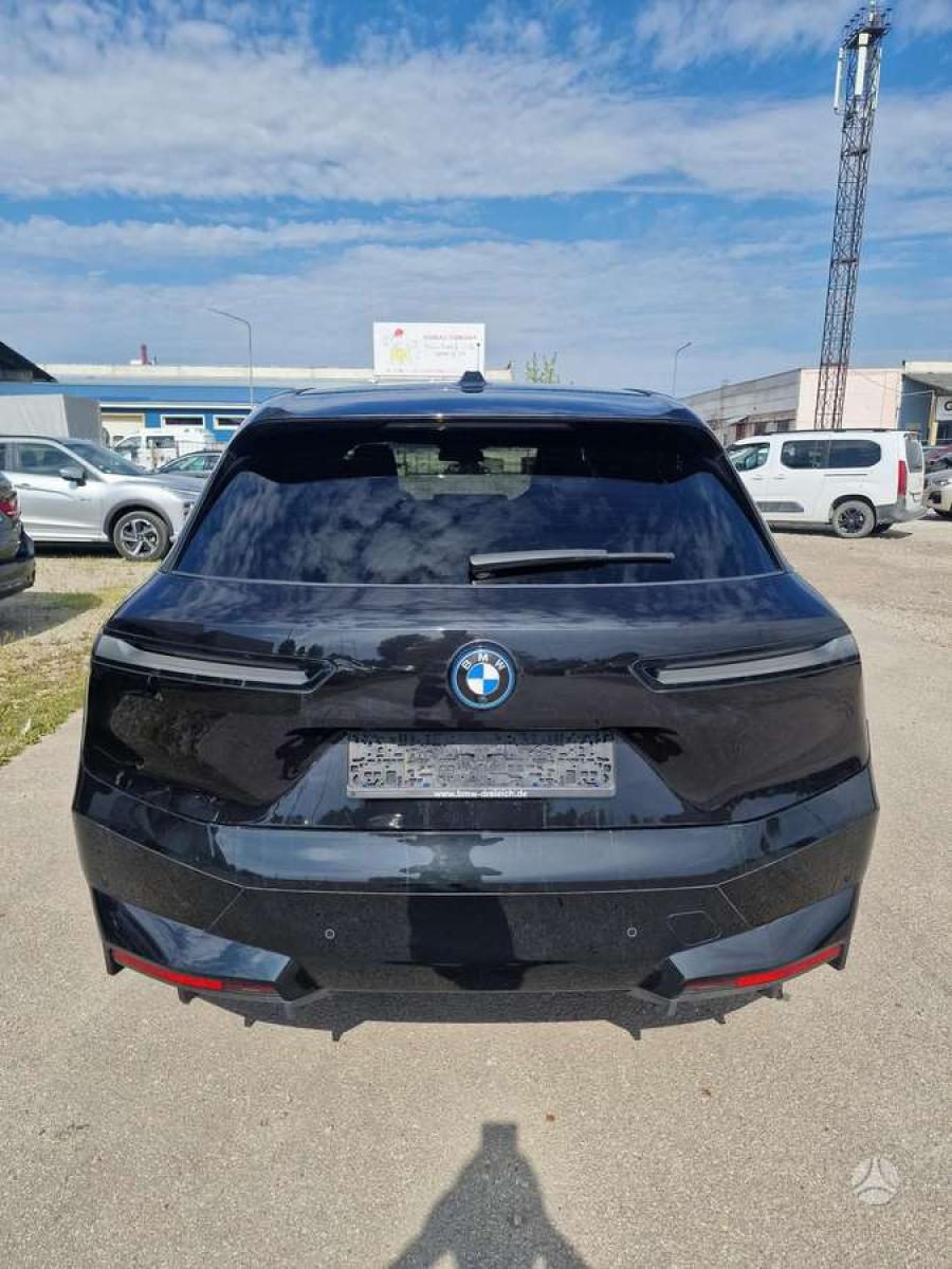 Black BMW iX 2022 in Siauliai, with an engine capacity of 0.00 L and mileage of 79 thousand km for 29900 €, photo 6 on AUTOMOTO.COM.LV