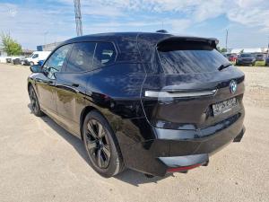 Black BMW iX 2022 in Siauliai, with an engine capacity of 0.00 L and mileage of 79 thousand km for 29900 €, photo 7 on AUTOMOTO.COM.LV