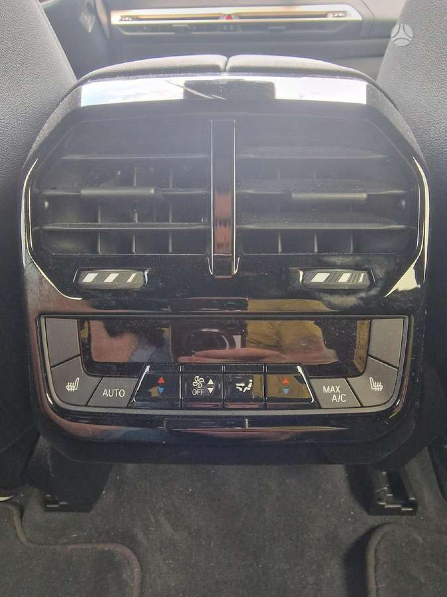 Black BMW iX 2022 in Siauliai, with an engine capacity of 0.00 L and mileage of 79 thousand km for 29900 €, photo 19 on AUTOMOTO.COM.LV