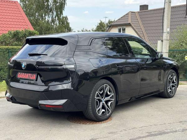 Black BMW iX 2022 in Siauliai, with an engine capacity of 0.00 L and mileage of 140 thousand km for 38700 €, photo 4 on AUTOMOTO.COM.LV