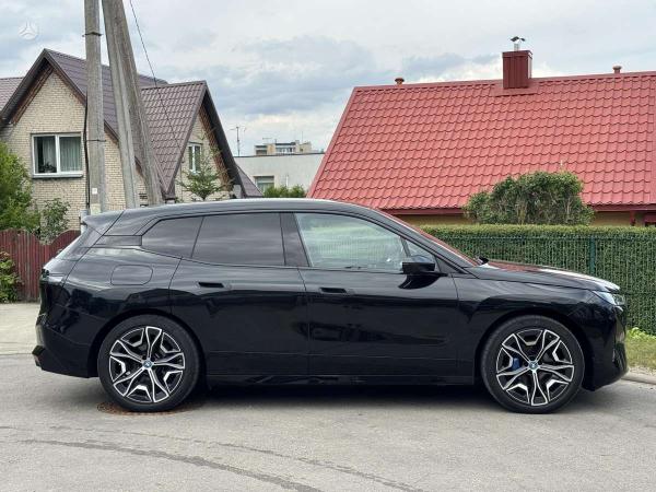 Black BMW iX 2022 in Siauliai, with an engine capacity of 0.00 L and mileage of 140 thousand km for 38700 €, photo 7 on AUTOMOTO.COM.LV