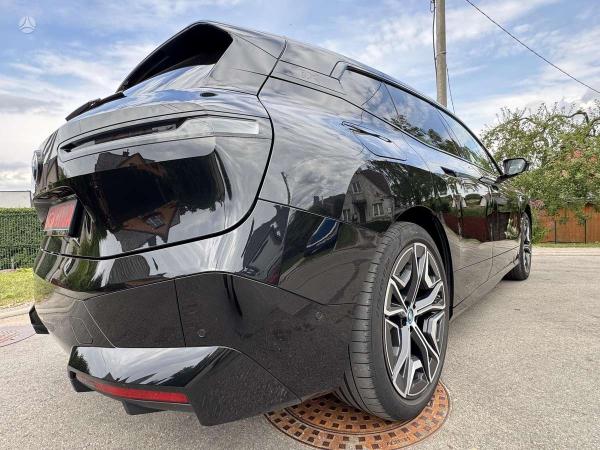 Black BMW iX 2022 in Siauliai, with an engine capacity of 0.00 L and mileage of 140 thousand km for 38700 €, photo 10 on AUTOMOTO.COM.LV