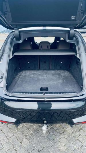 Black BMW iX 2023 in Kaunas, with an engine capacity of 0.00 L and mileage of 24 thousand km for 48500 €, photo 6 on AUTOMOTO.COM.LV