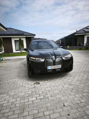 Black BMW iX 2023 in Kaunas, with an engine capacity of 0.00 L and mileage of 59 thousand km for 42000 €, photo 5 on AUTOMOTO.COM.LV