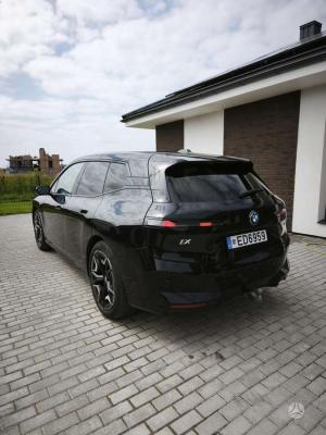Black BMW iX 2023 in Kaunas, with an engine capacity of 0.00 L and mileage of 59 thousand km for 42000 €, photo 6 on AUTOMOTO.COM.LV